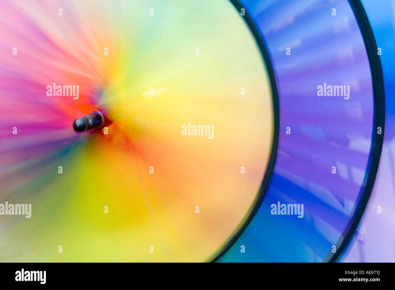 Windmill III. A spiral weather vane or wind vane made of colorful ...