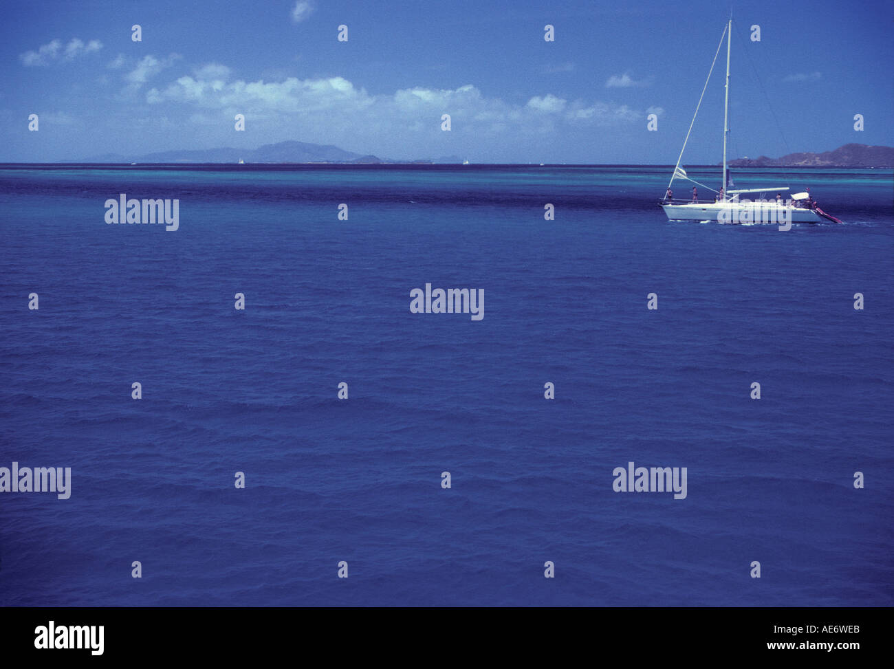 "sailing yacht motoring in Caribbean sea Stock Photo - Alamy