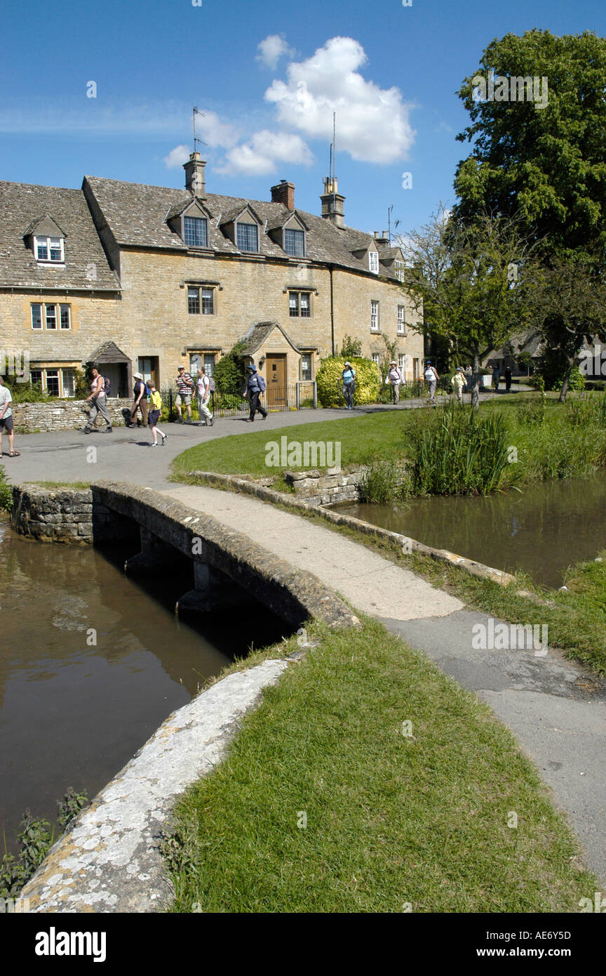 Bridge over the stream in the picturesque Cotswold village of Lower ...