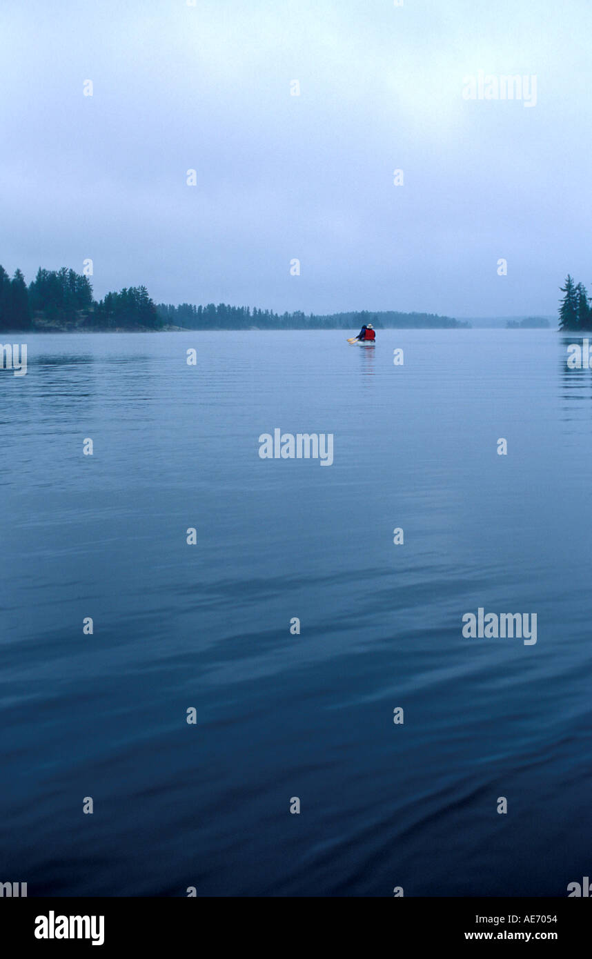 Canoeing on a Canadian lake Quetico Provincial Park Ontario Canada ...