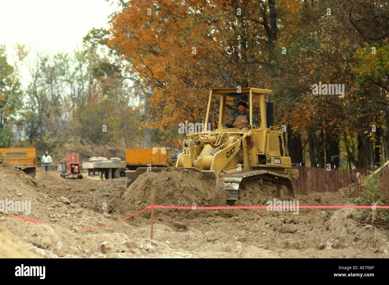 Caterpillar track loader at commercial construction site Stock Photo ...