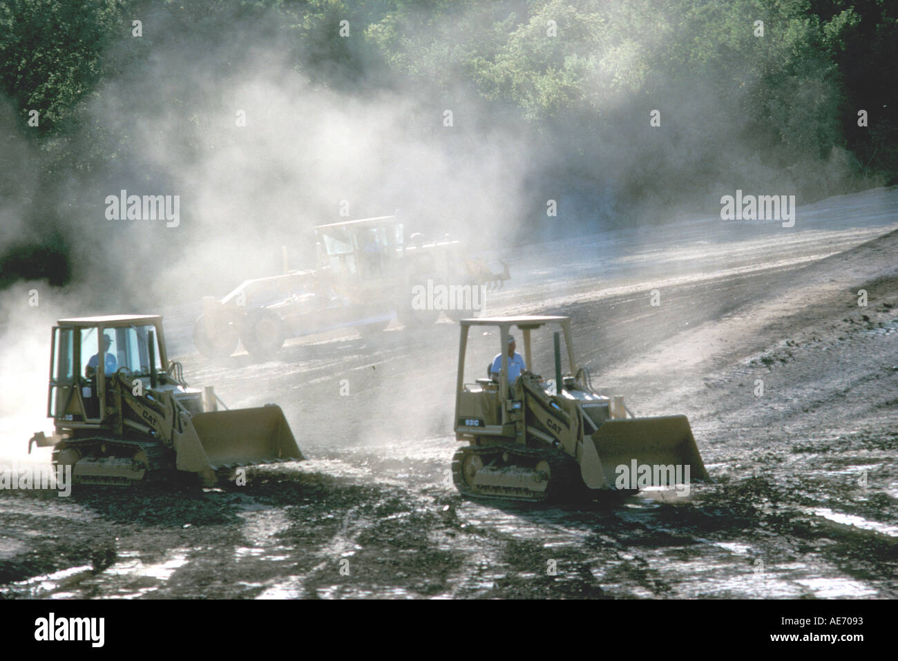 Caterpillar track loaders at job site Stock Photo - Alamy