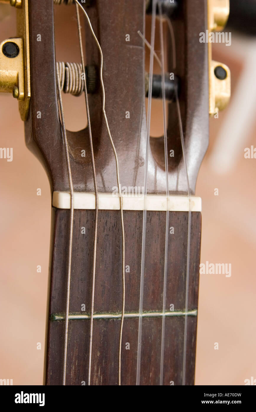 Guitar with broken string Stock Photo - Alamy