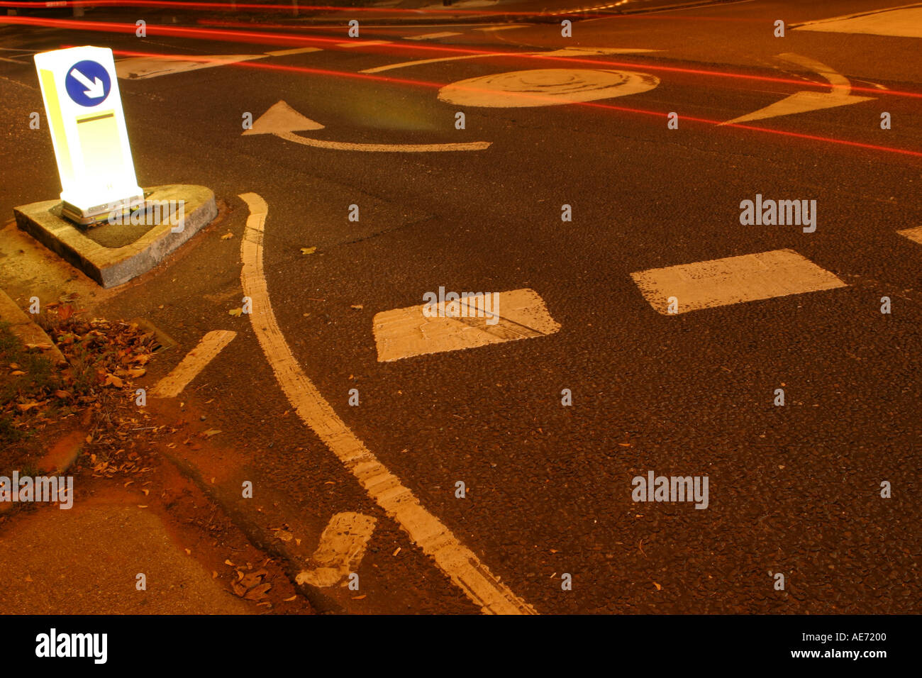 Mini roundabout in north London at night Stock Photo - Alamy