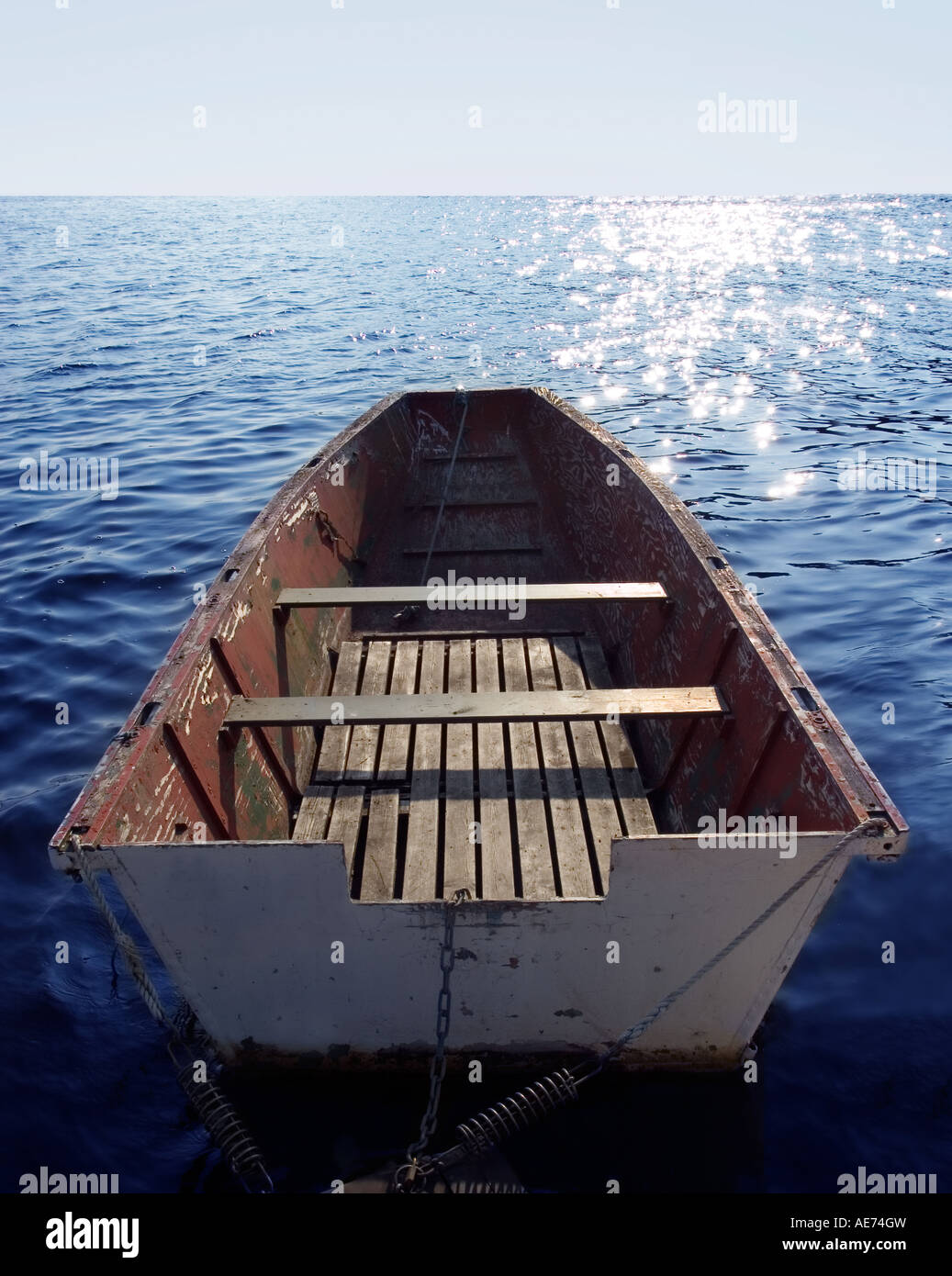 Alone rowing boat Stock Photo - Alamy