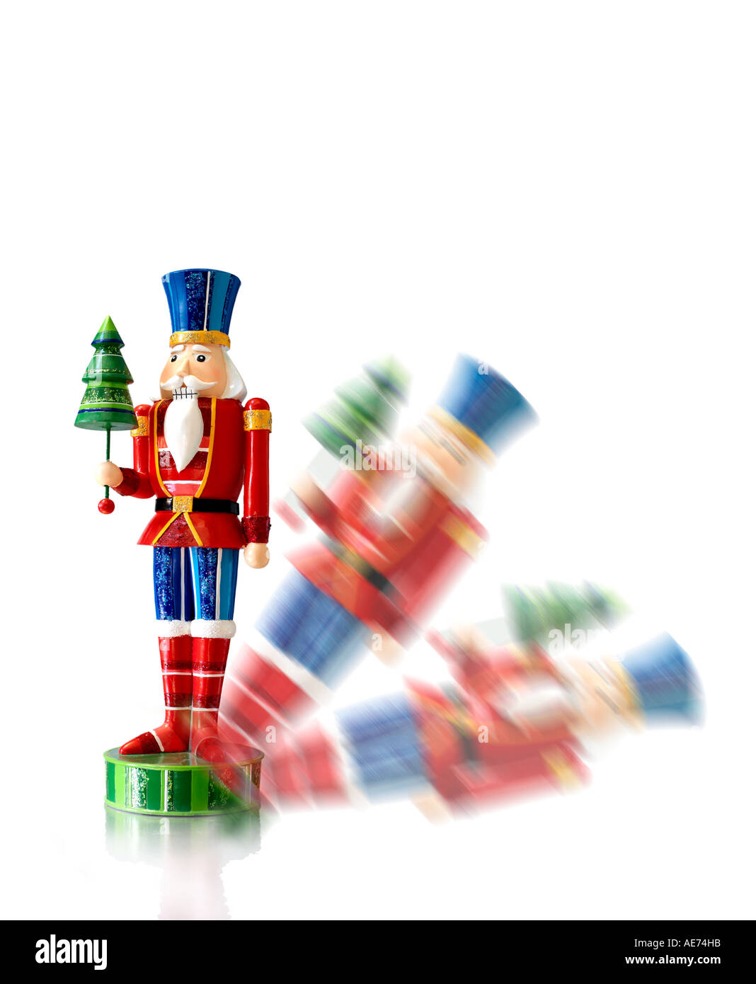 Festive toy soldier falling over Stock Photo - Alamy