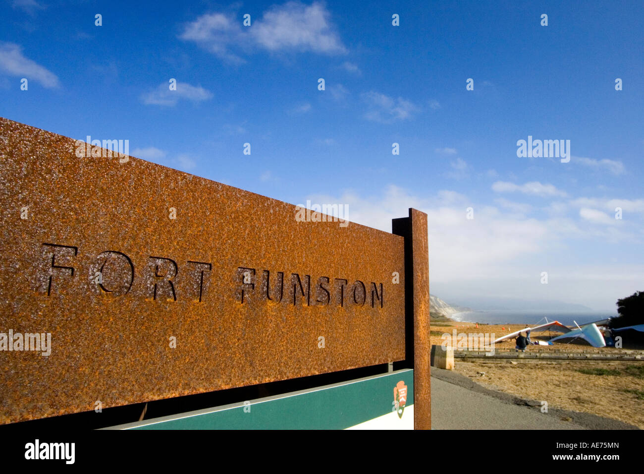 Fort Funston sign with hang gliders and the California coastline in the ...