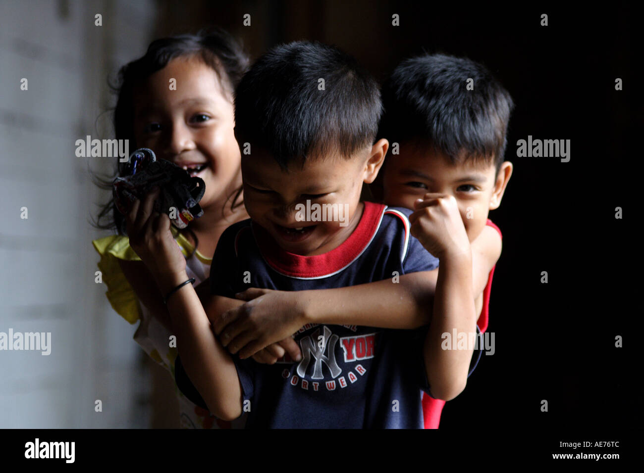 Malaysian Children Playing Inside Rumah Bundong, a Traditional Iban ...