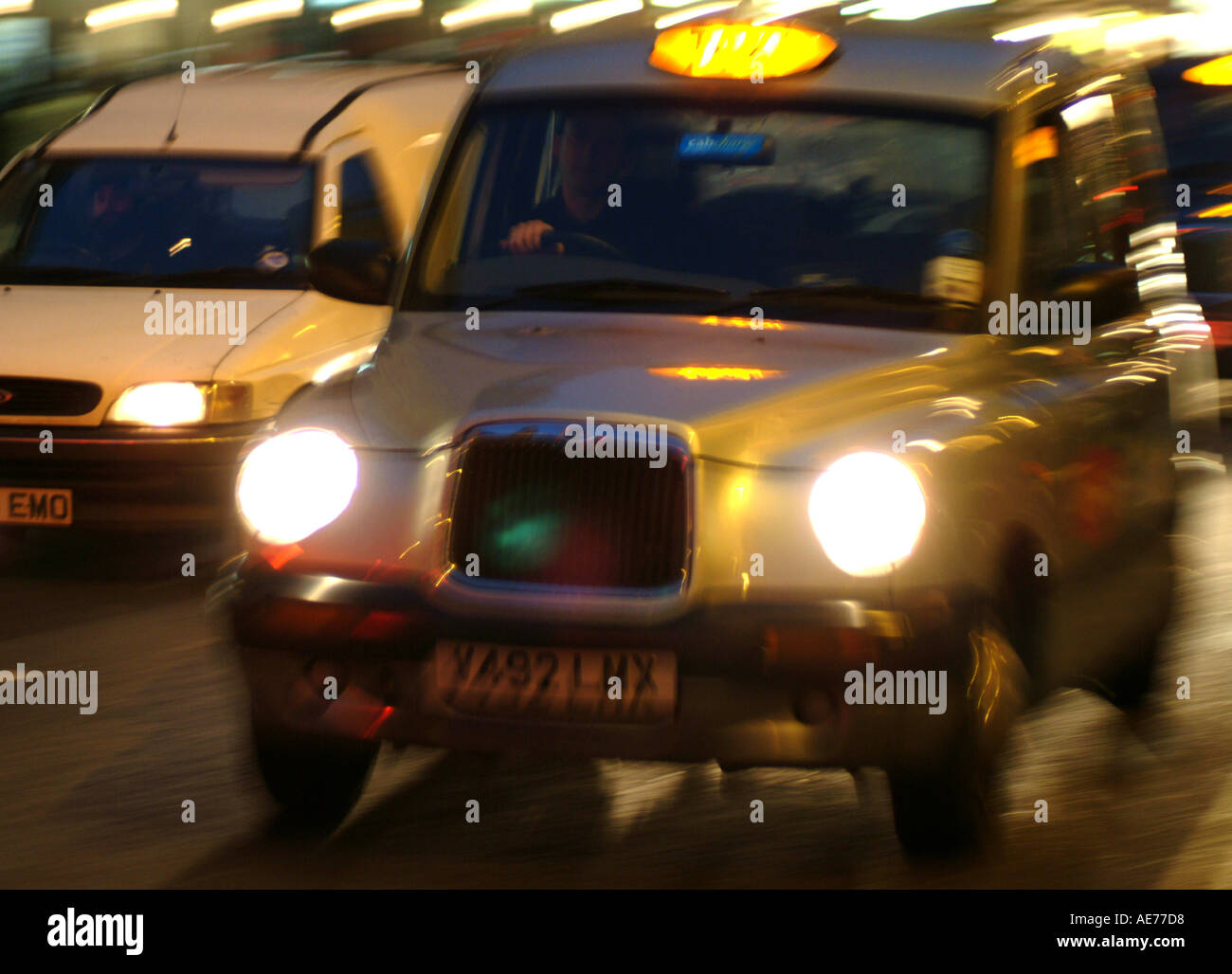 London taxi night passengers hi-res stock photography and images - Alamy