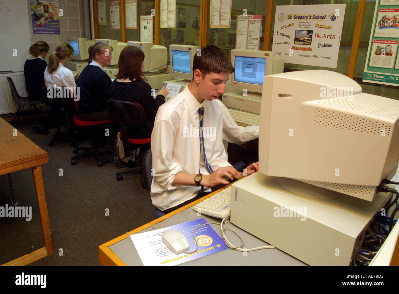 Secondary school children working with computers Stock Photo - Alamy