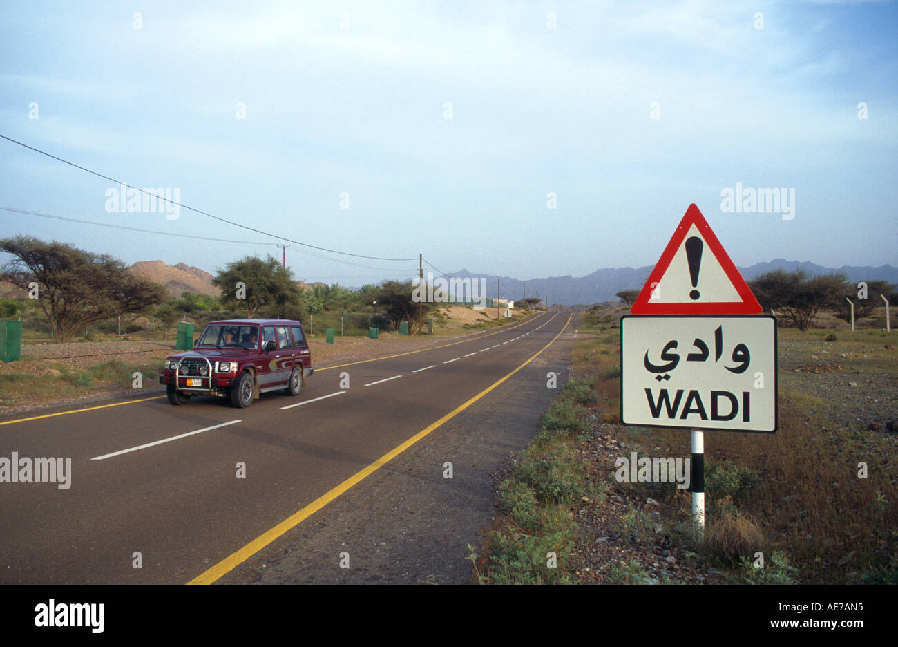 Wadi Warning Road sign, United Arab Emirates Stock Photo - Alamy