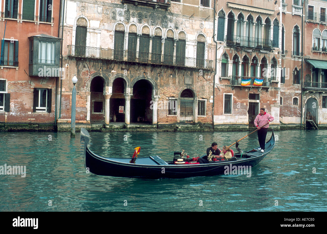 Romantic gondola ride in Venice Italy Stock Photo - Alamy