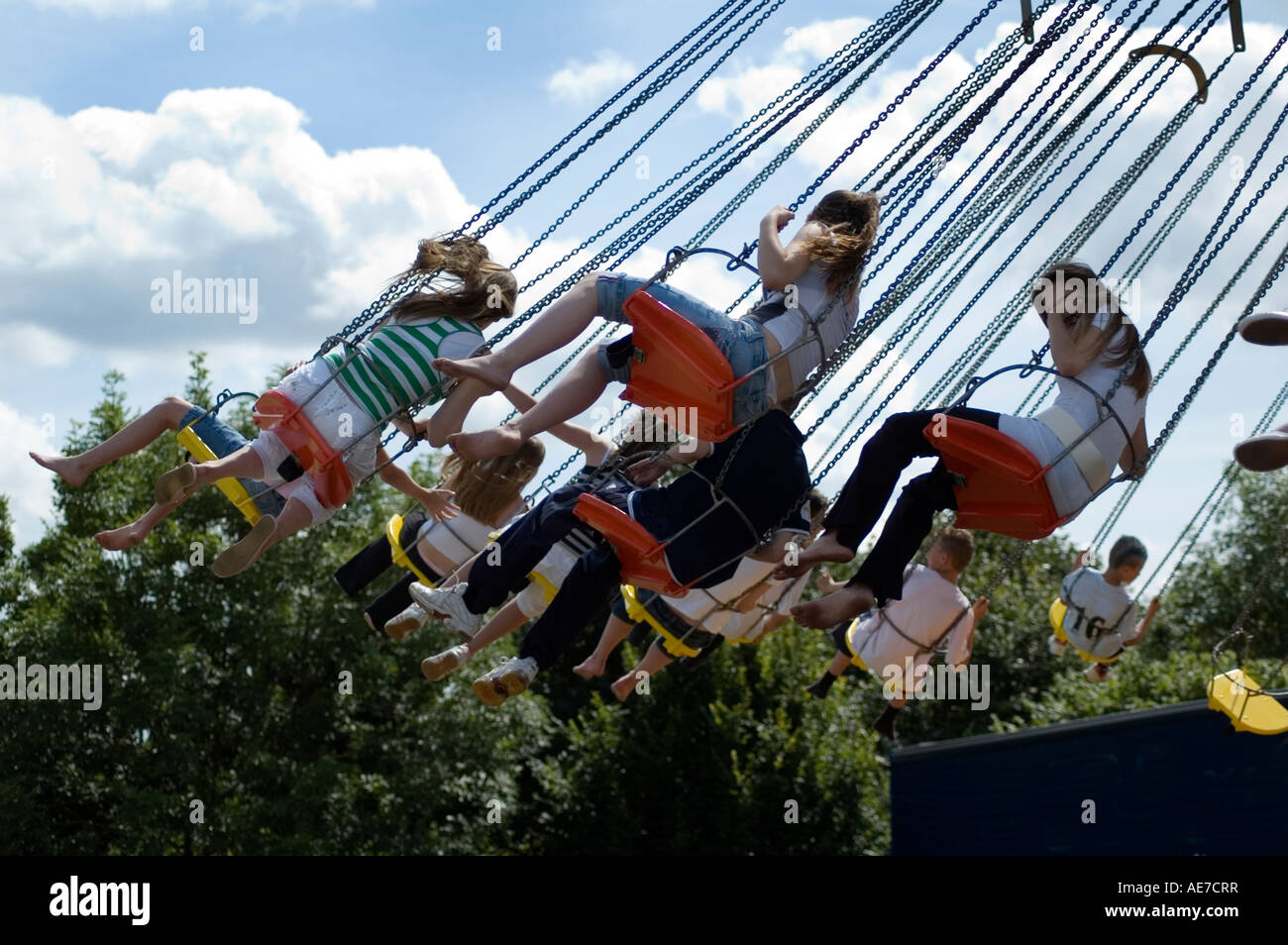 happy teenager on Fairground Ride Stock Photo - Alamy