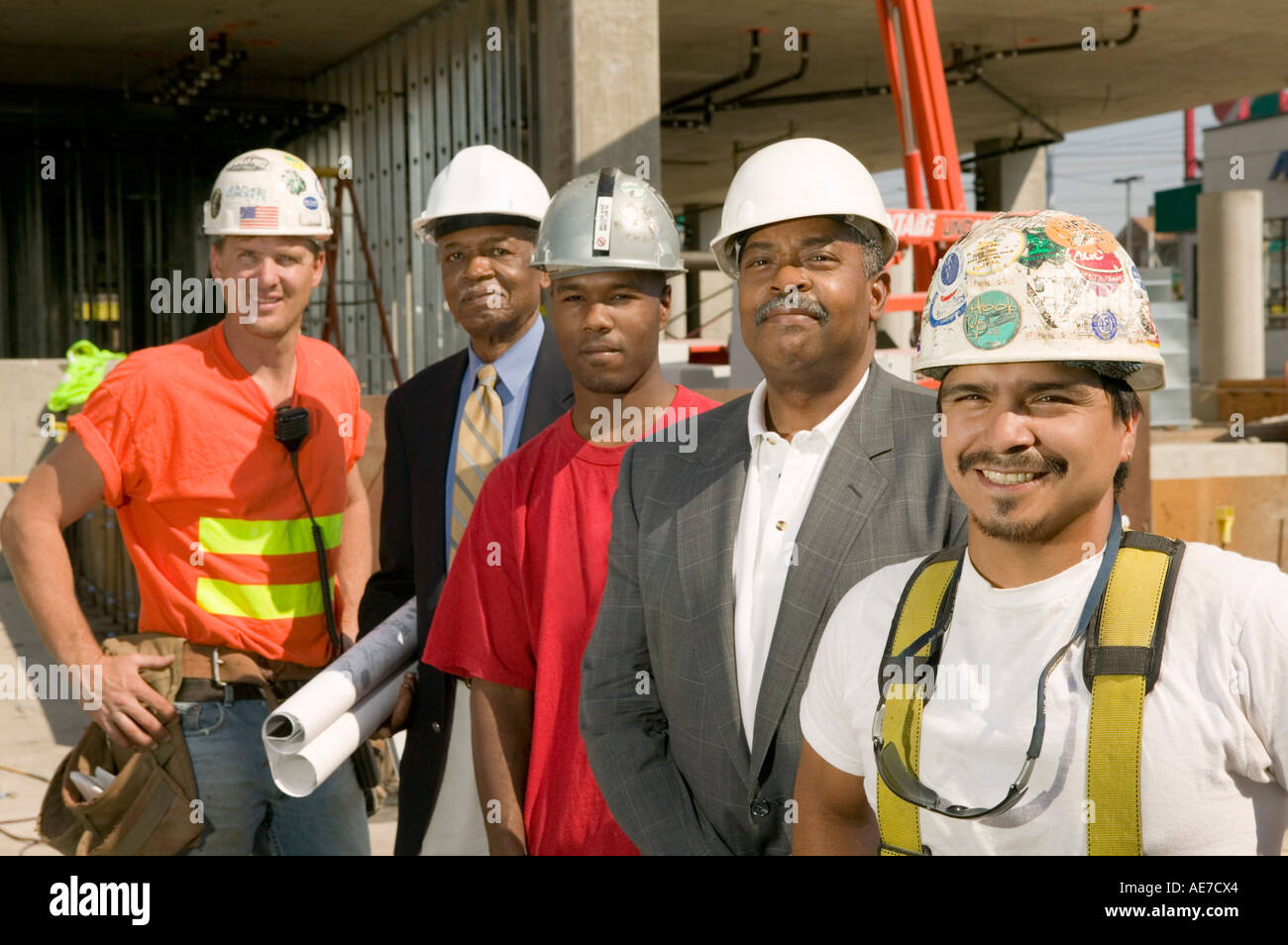 Group portrait of men at construction site Stock Photo - Alamy