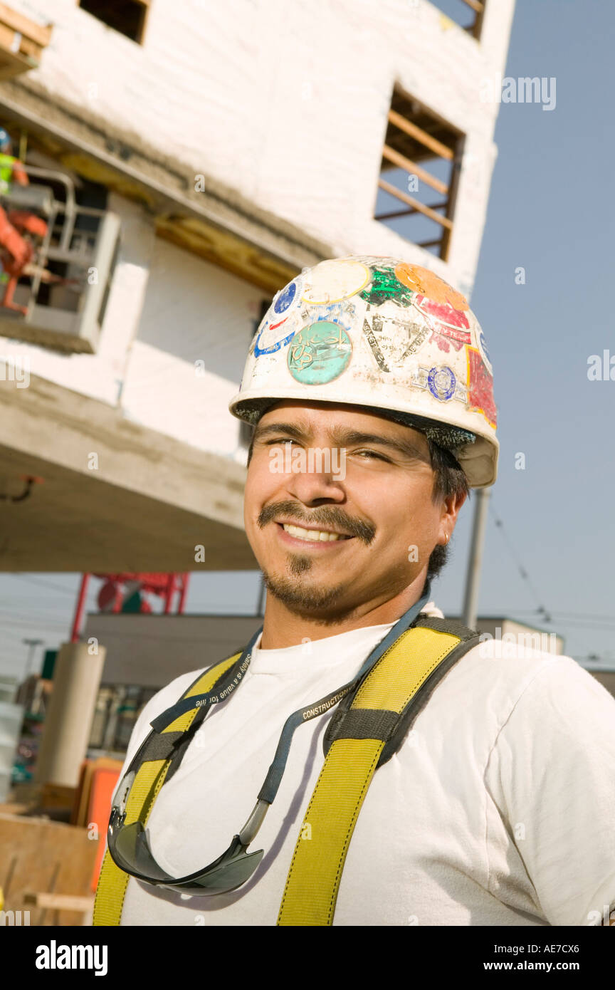 Portrait of man wearing hard hat Stock Photo - Alamy