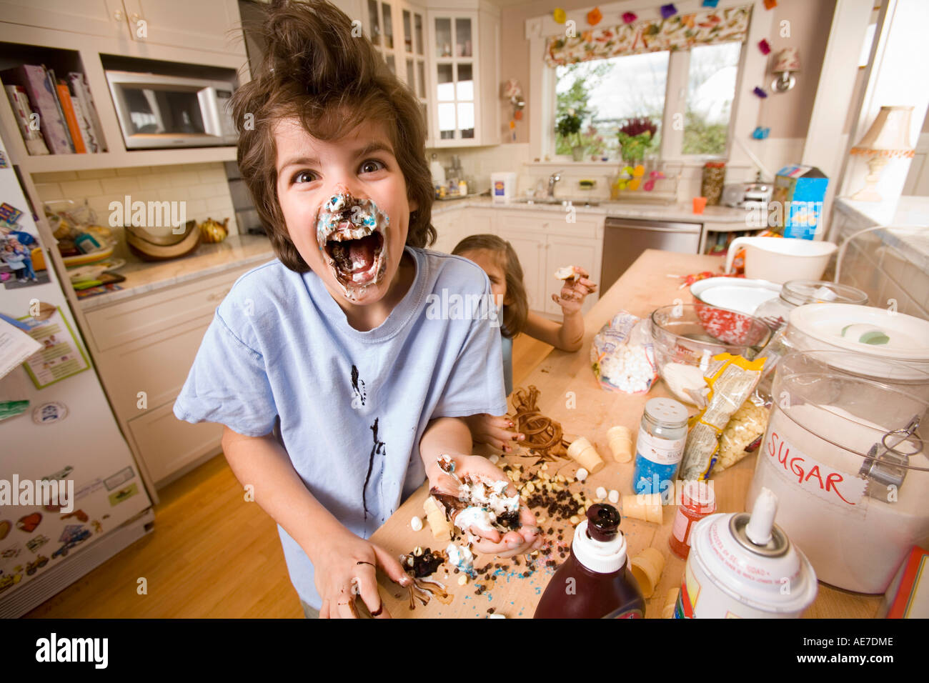 Portrait of boy with food on face Stock Photo - Alamy