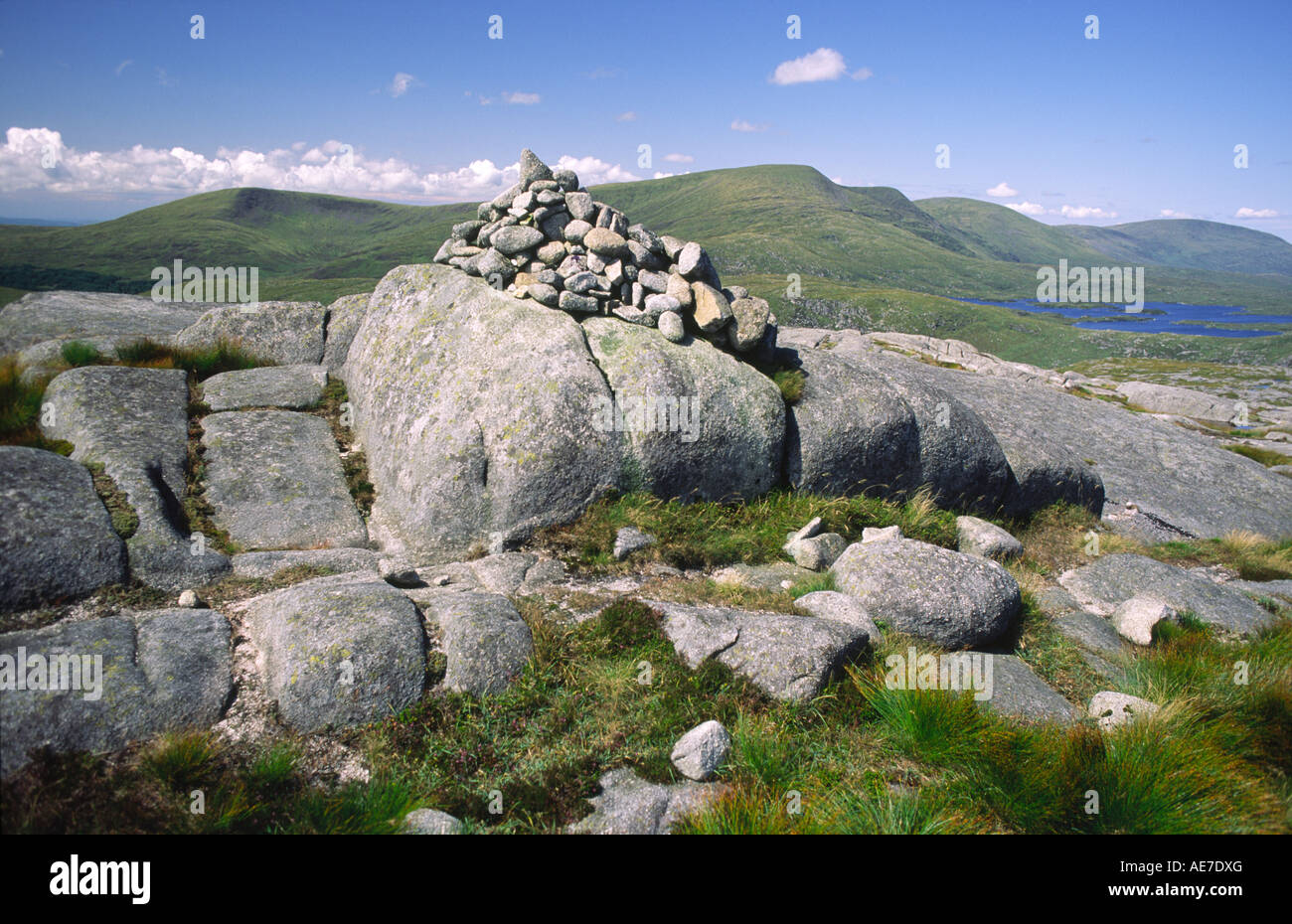 A summer Scottish landscape Galloway Hills cairn atop of Craignaw ...