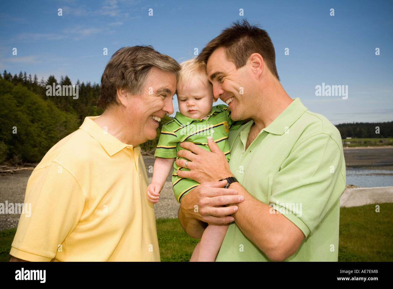 Family smiling together Stock Photo - Alamy