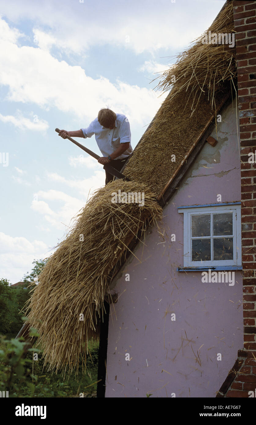 Traditional thatch roof on refurbished cottage nearing completion ...