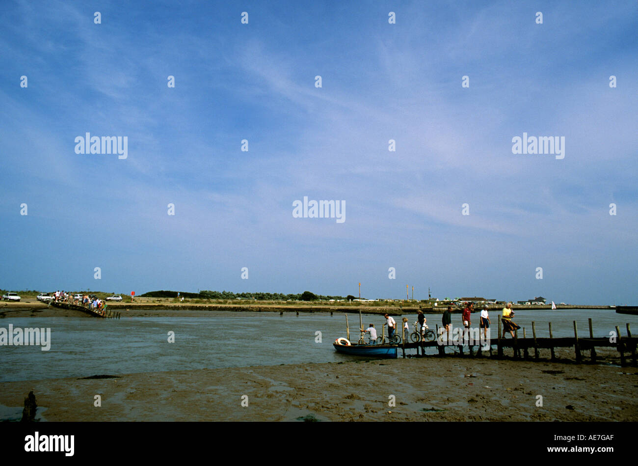 Small summer passenger ferry rows visitors across The River Blyth from ...