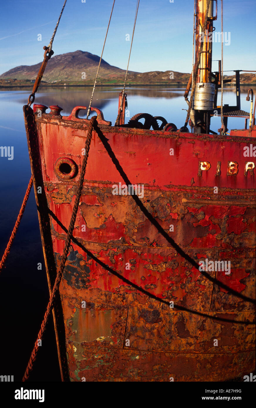 Old Wreck of a Rusty Red Boat in Ireland Stock Photo - Alamy