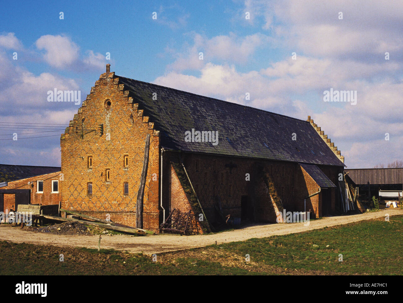Large ornate barn with patterned brickwork and stepped gables Formerly ...