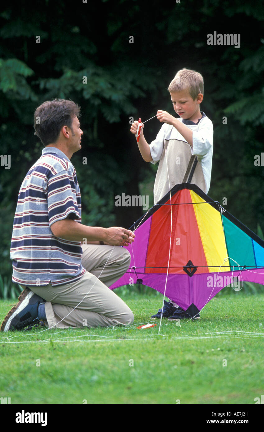 Father and son with a kite Stock Photo - Alamy