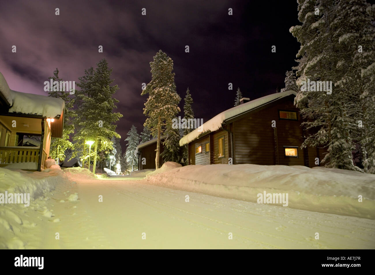 log cabins in the snow at night Stock Photo - Alamy