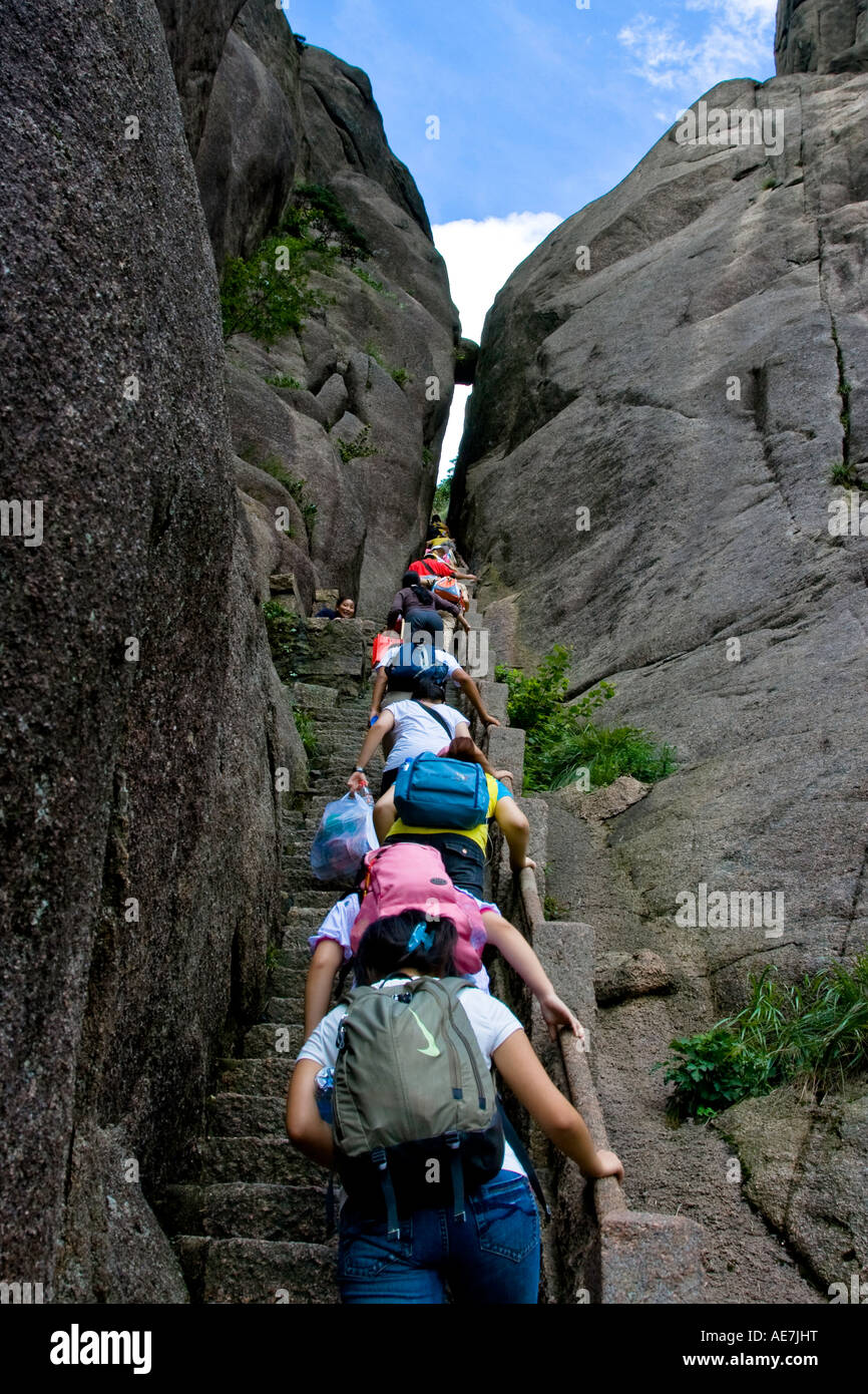 Hikers Climbing Stone Stairs up Gleam of Sky toward Suspended Stone ...