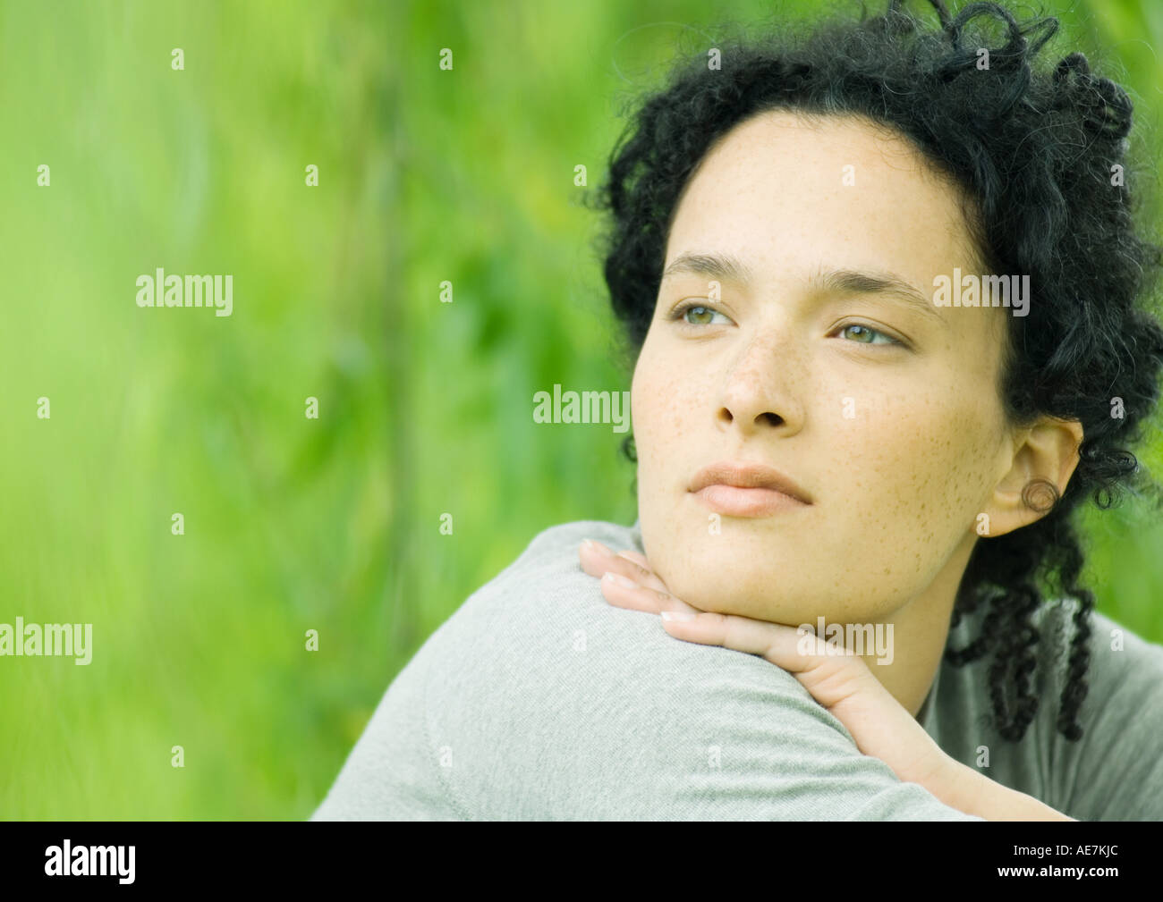 Curly woman turning away hi-res stock photography and images - Alamy