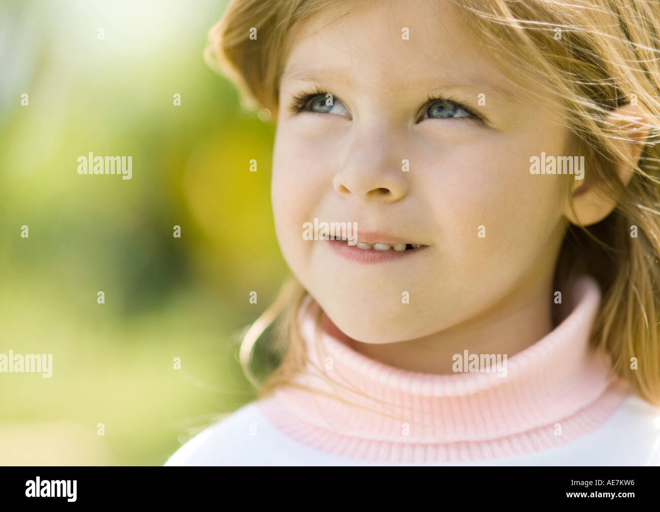 Girl looking up, portrait Stock Photo - Alamy