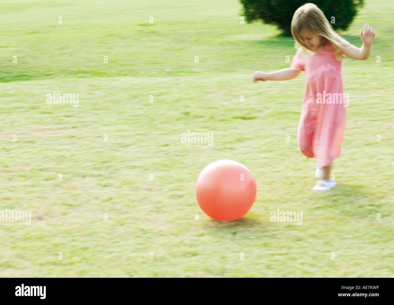Children running after ball hi-res stock photography and images - Alamy