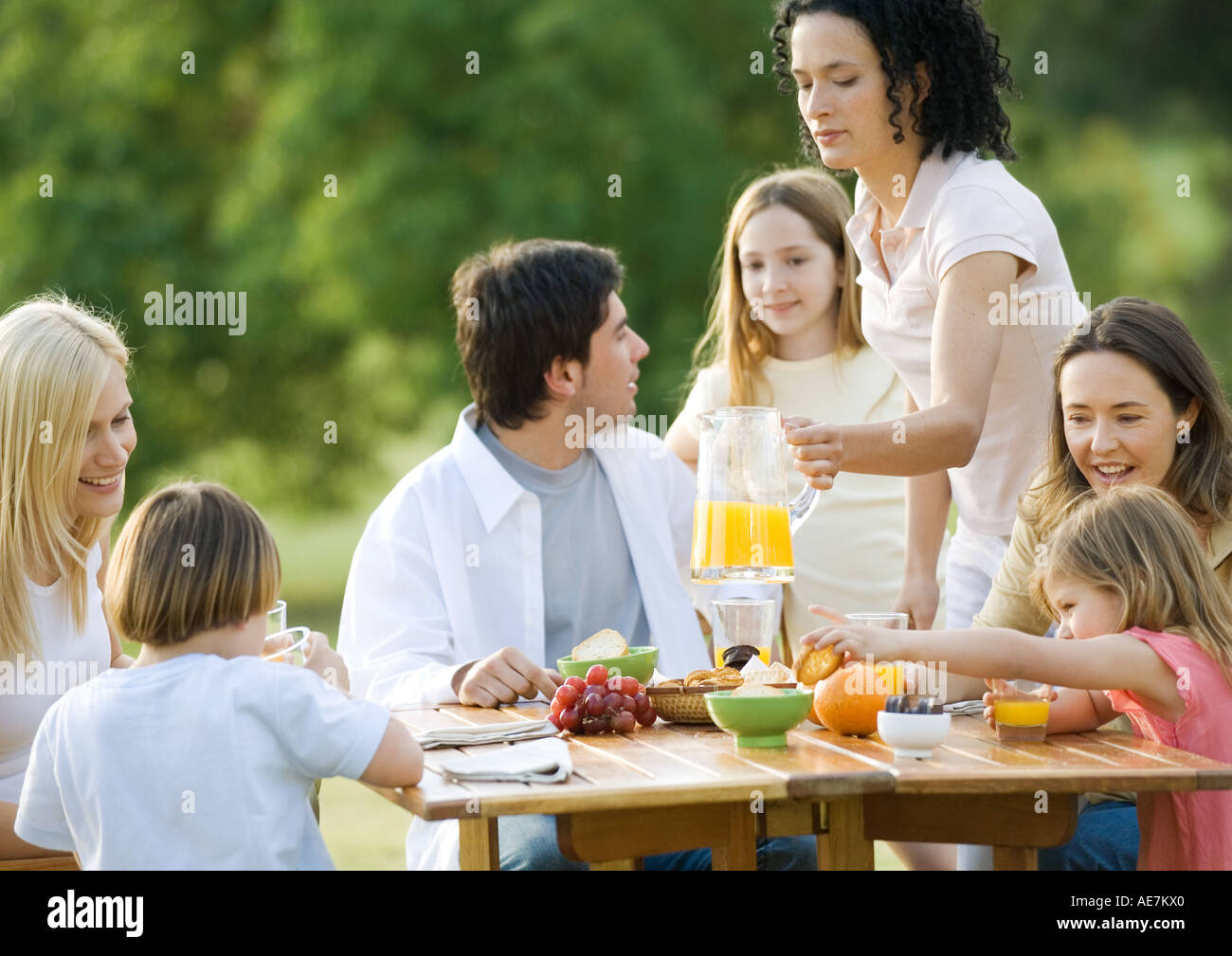 Happy man serves breakfast hi-res stock photography and images - Alamy