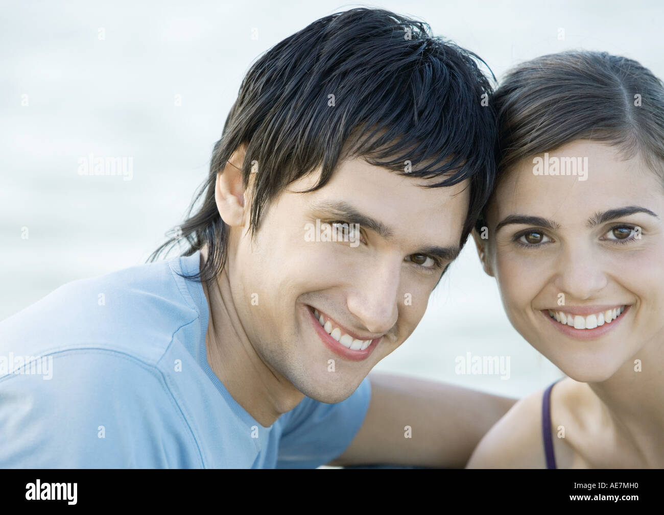 Young couple, head to head, smiling, portrait Stock Photo - Alamy