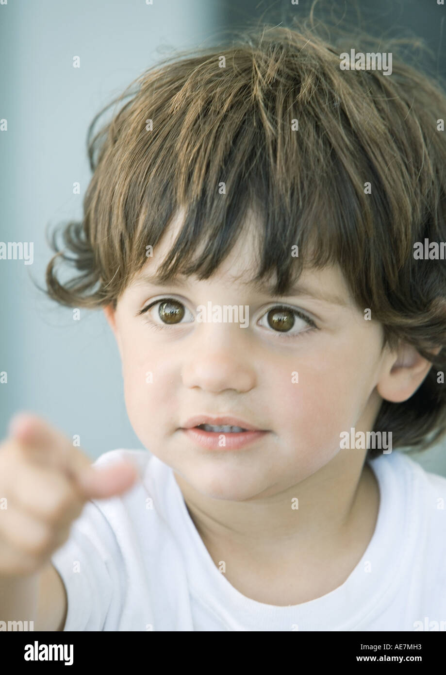Boy pointing, portrait Stock Photo - Alamy