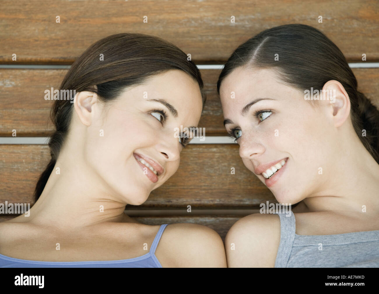 Two young women, face to face, close-up Stock Photo - Alamy