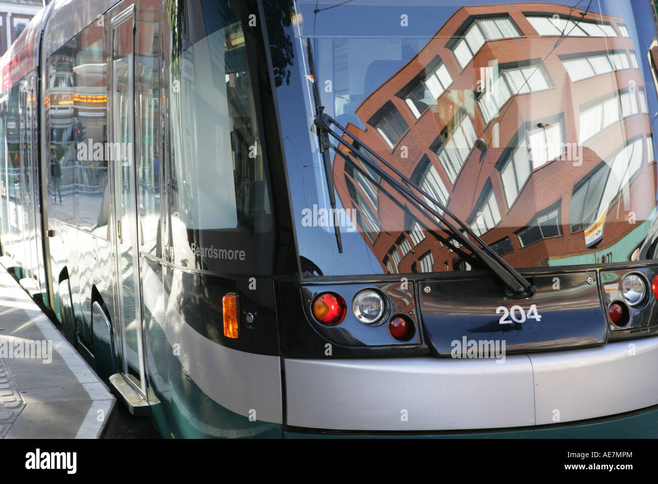 Reflection of building in tram window Stock Photo - Alamy