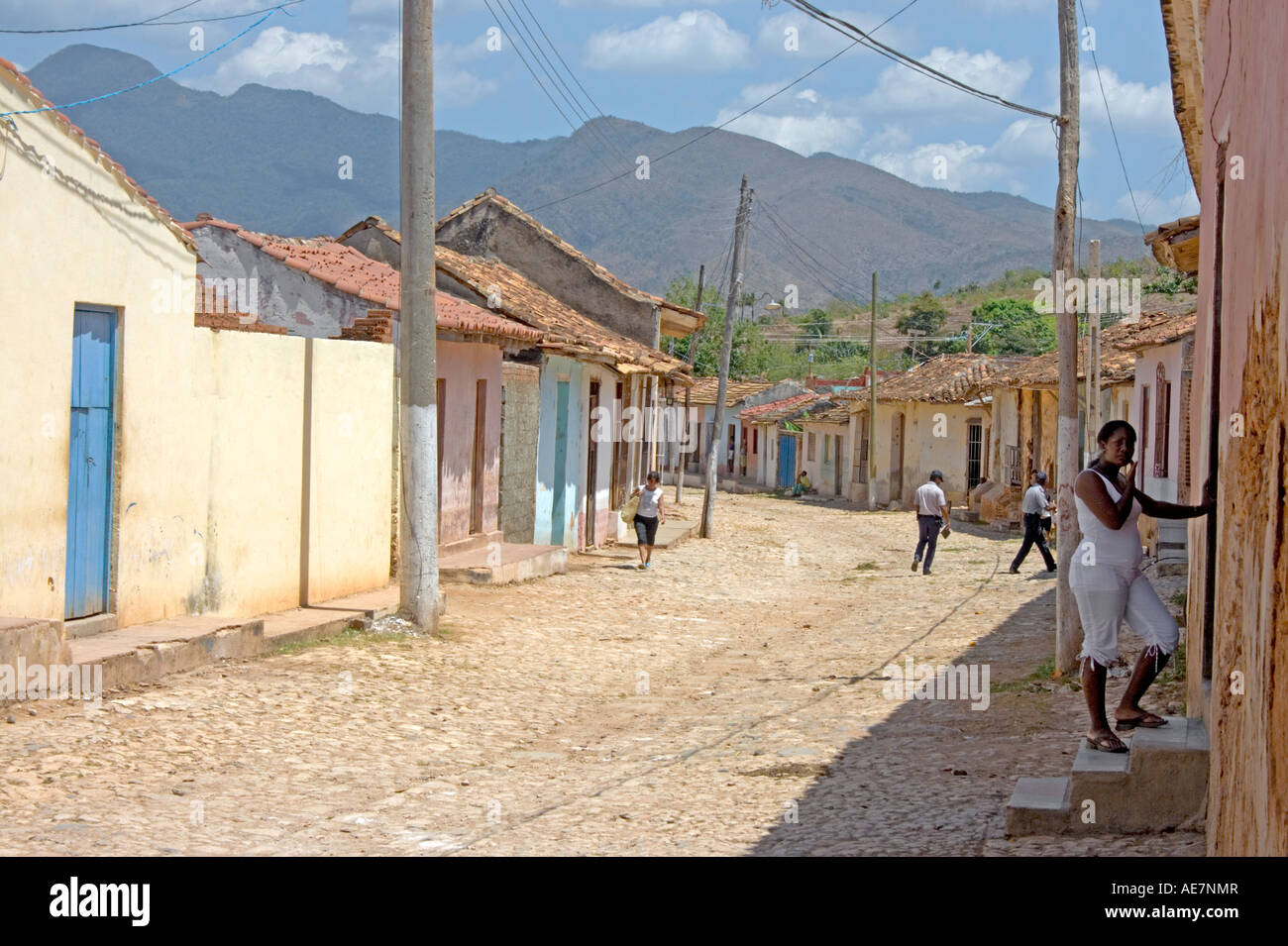 Trinidad street scene, Cuba, with the Sierra del Escambray rising in ...