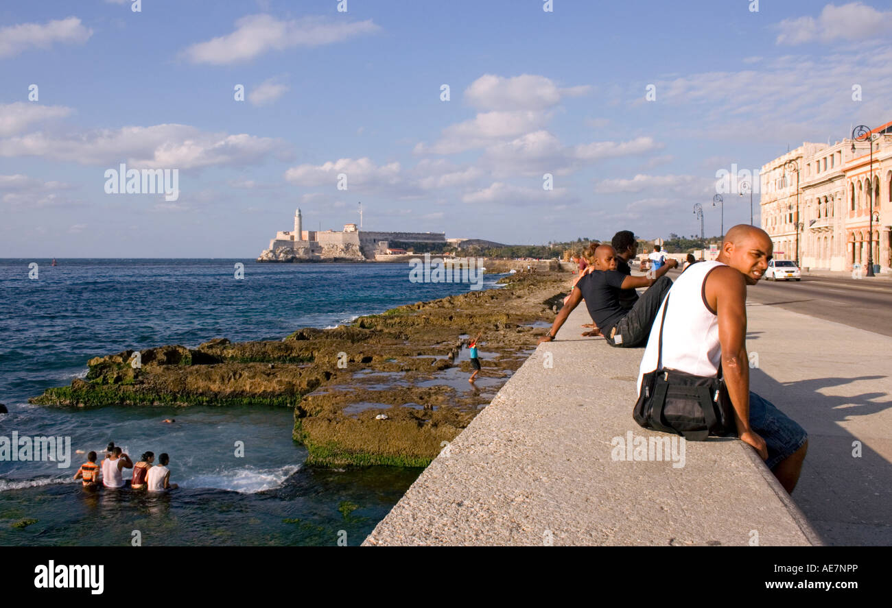 Late afternoon on the Malecon sea wall, Havana waterfront, Cuba, with ...