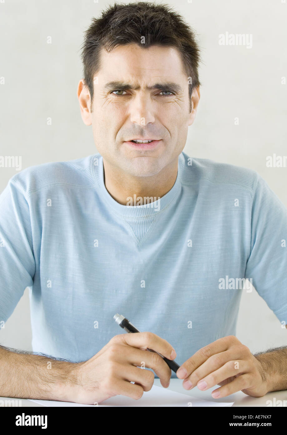 Furrowing brow hi-res stock photography and images - Alamy