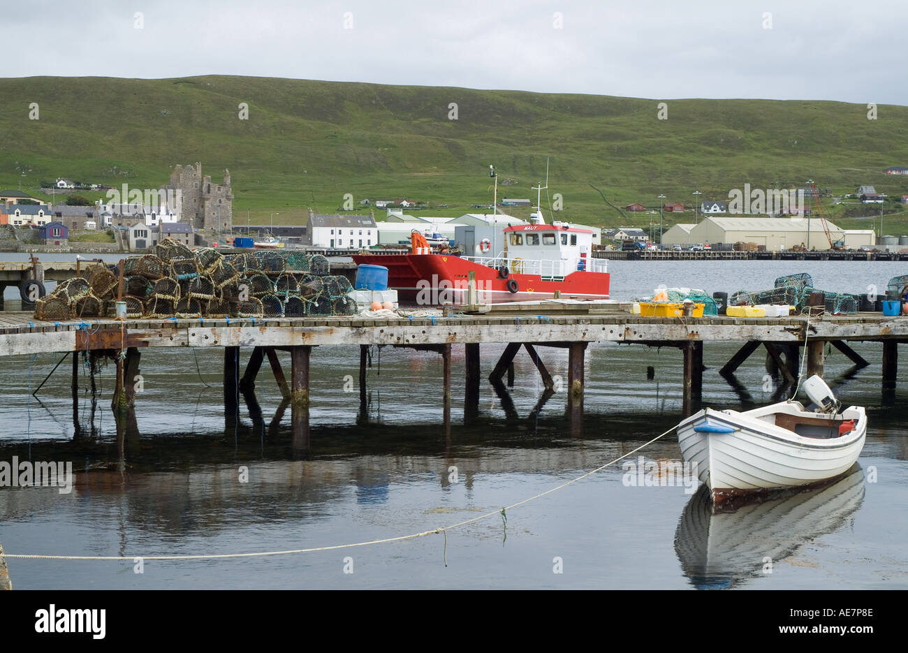 dh Scalloway harbour SCALLOWAY SHETLAND Pier with lobster pots crab ...