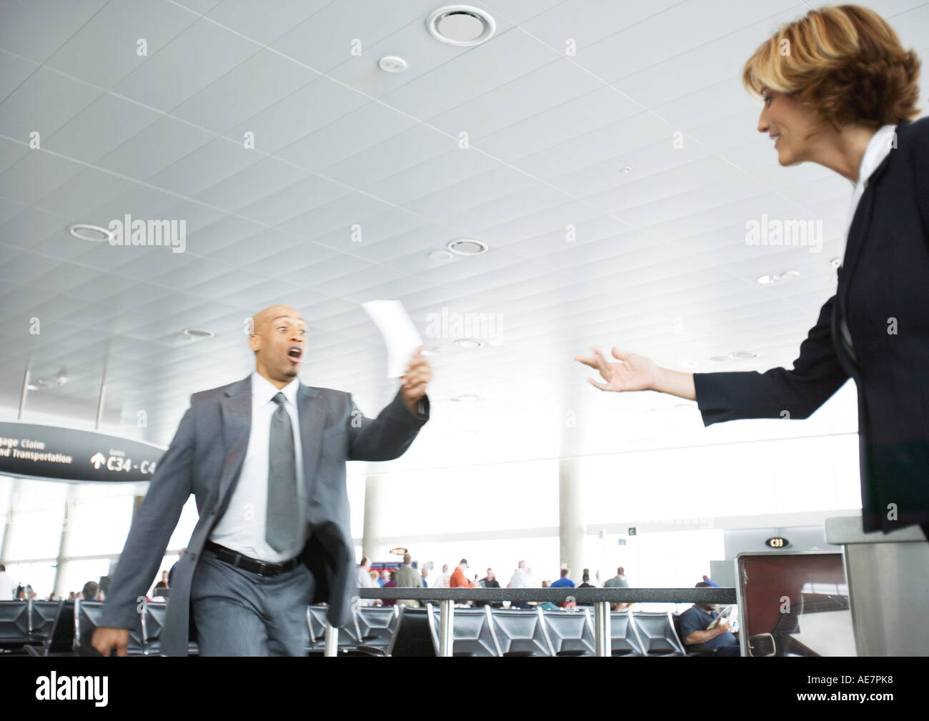 Rushing businessman holding up ticket hi-res stock photography and ...