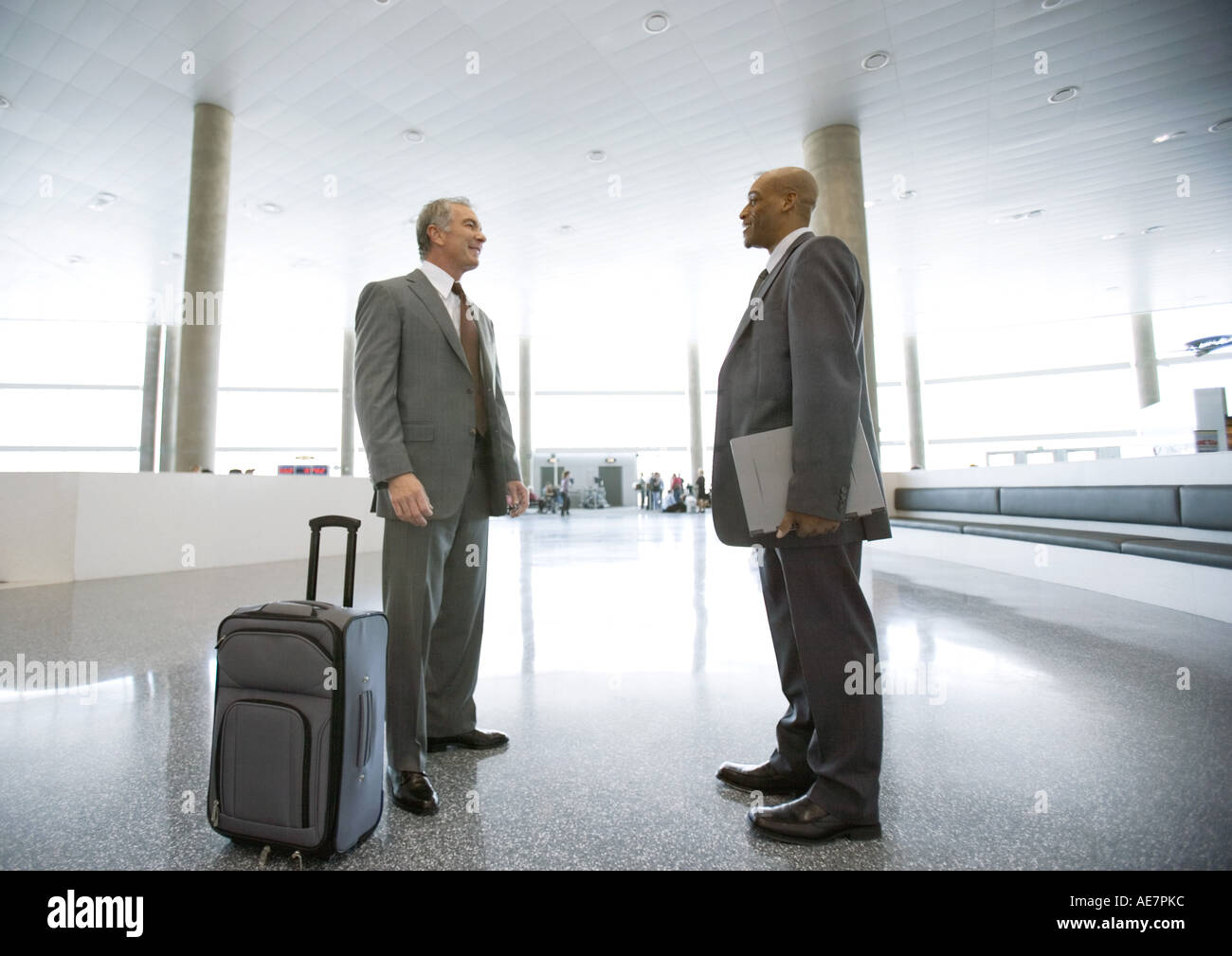 Black businessmen talking standing hi-res stock photography and images ...