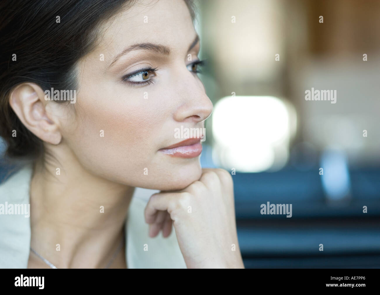 Woman with hand under chin, close-up, portrait Stock Photo - Alamy