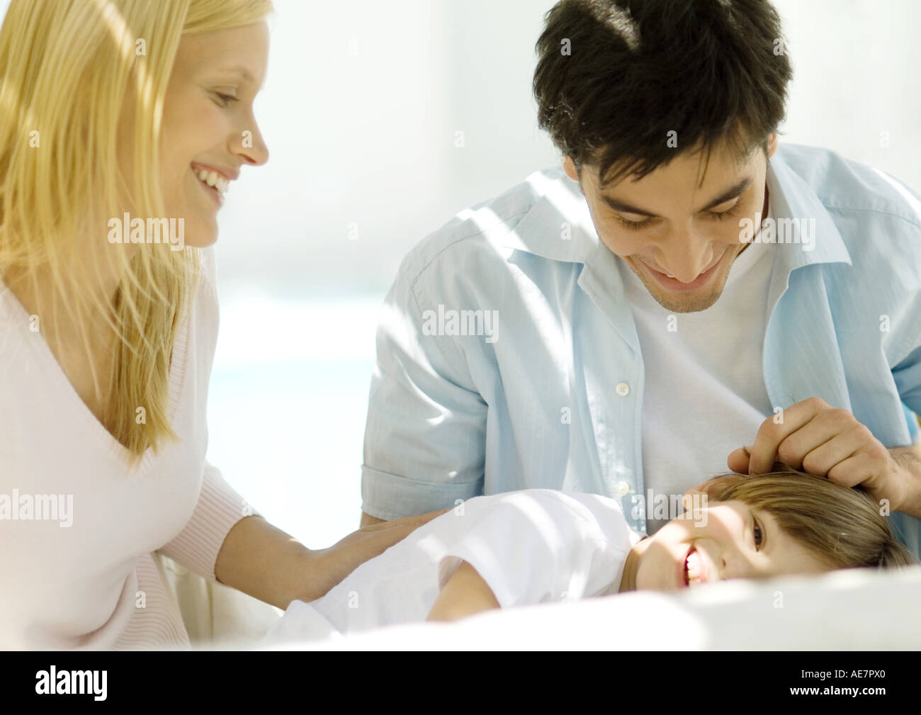 Parents with child Stock Photo - Alamy