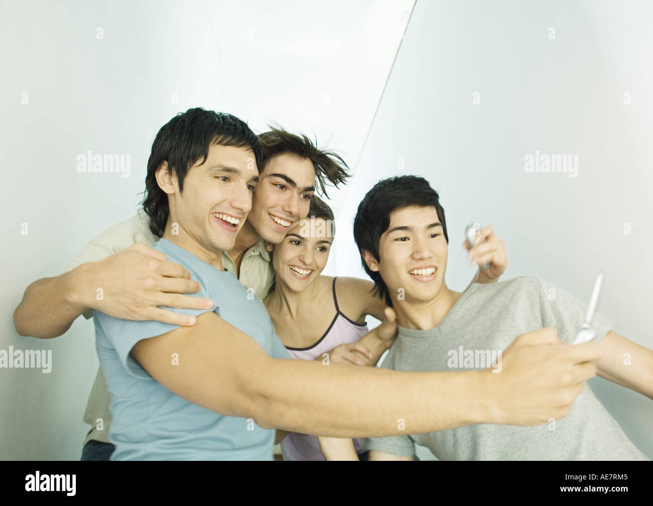 Taking group photo with cell phone Stock Photo - Alamy