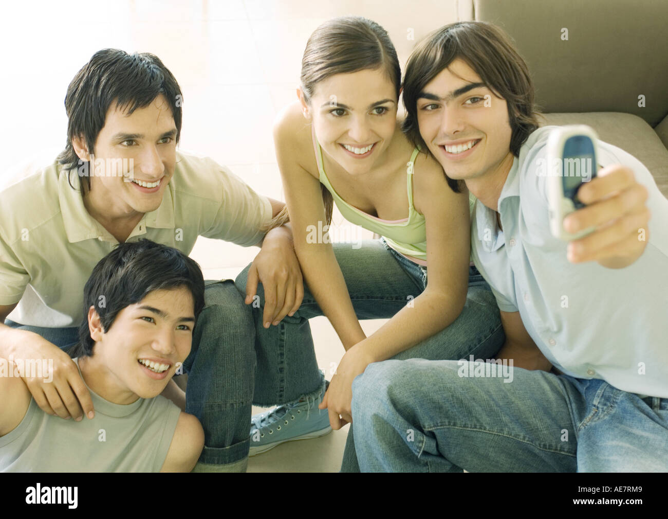 Taking group photo with cell phone Stock Photo - Alamy