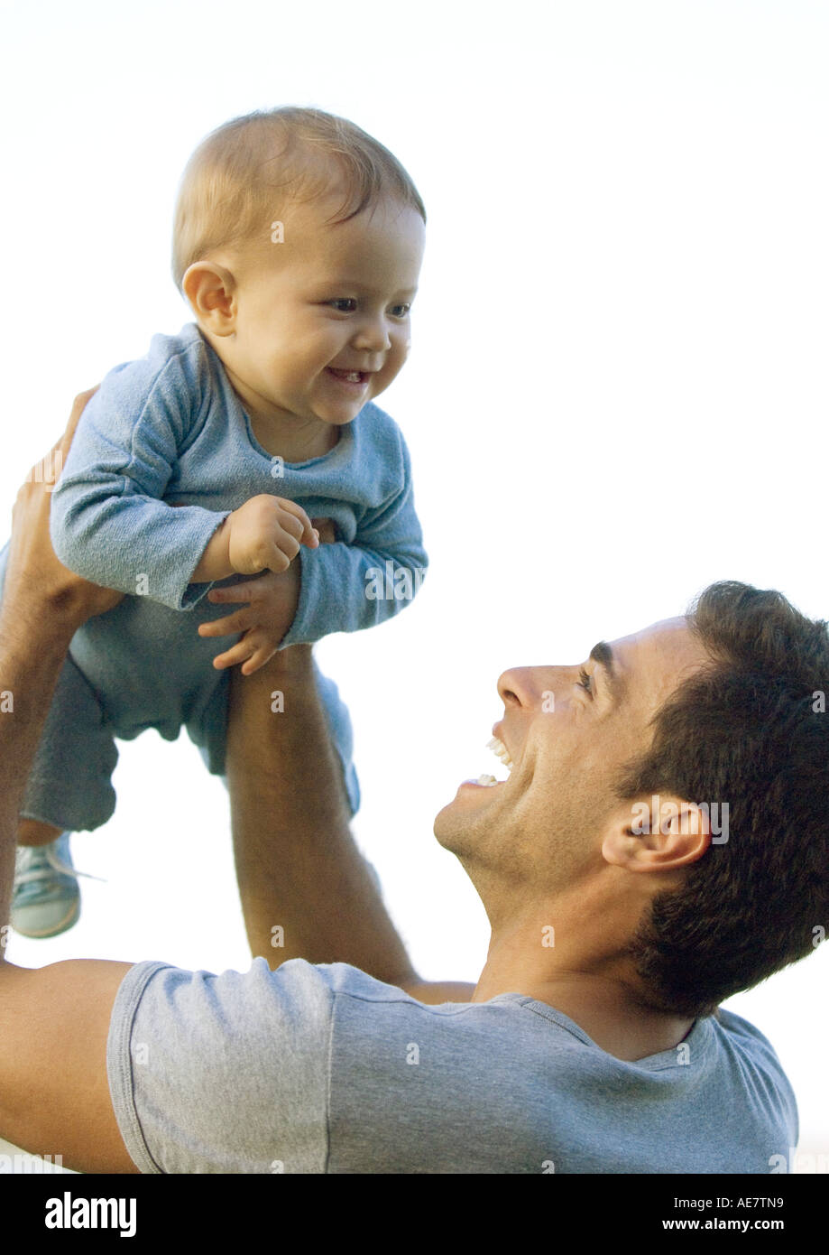 Man Carrying Baby