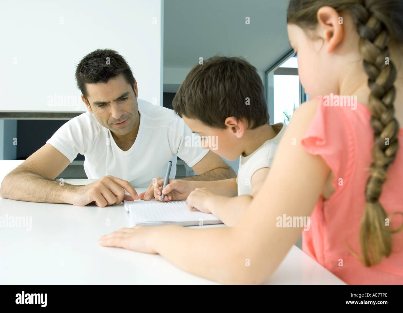 Brother helps with homework hi-res stock photography and images - Alamy