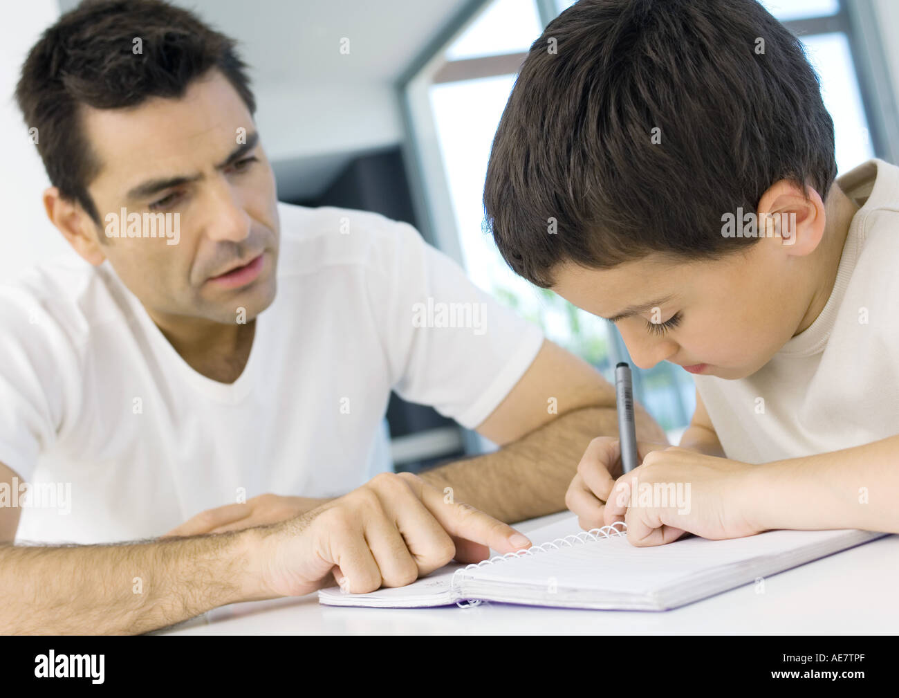 Son doing homework dad hi-res stock photography and images - Alamy